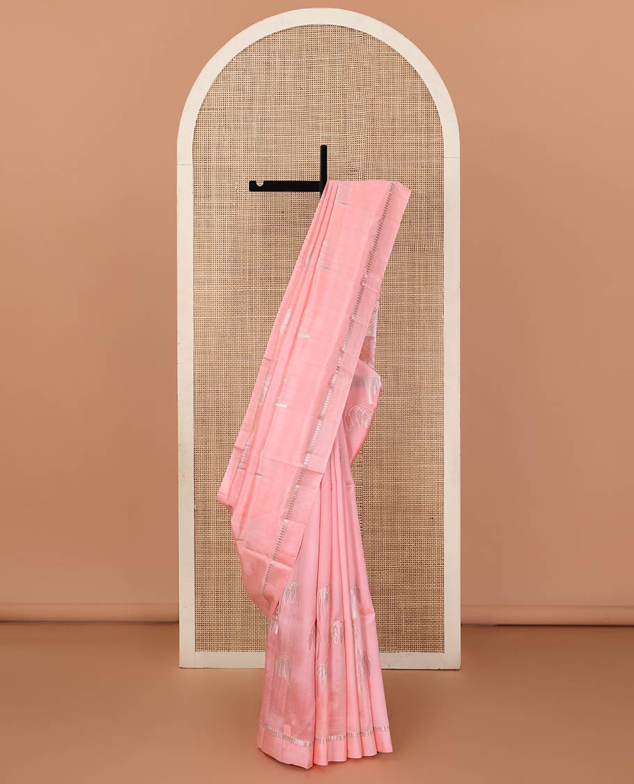 Peach floral buttas raw mango silk saree, zari border, and zari rich j