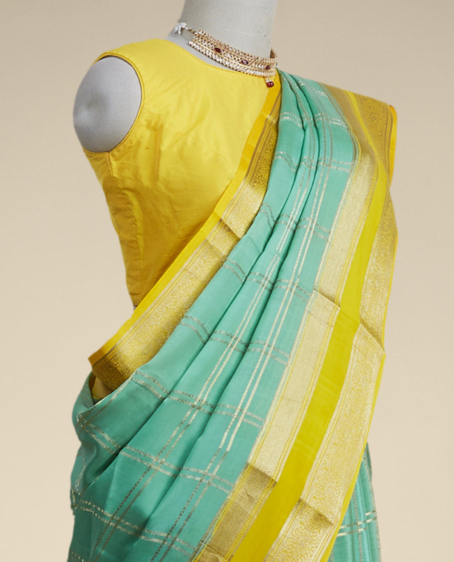 Green checked mysore silk saree with contrast intricate zari border