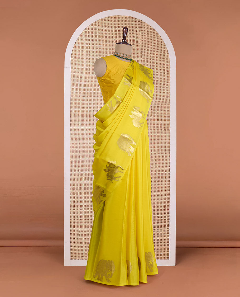 Yellow plain Mysore silk saree, zari border of elephant and kuthirai m
