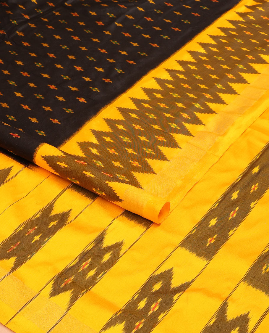 Black ikkat saree with ikkat buttas, contrast ikkat border & pallu of