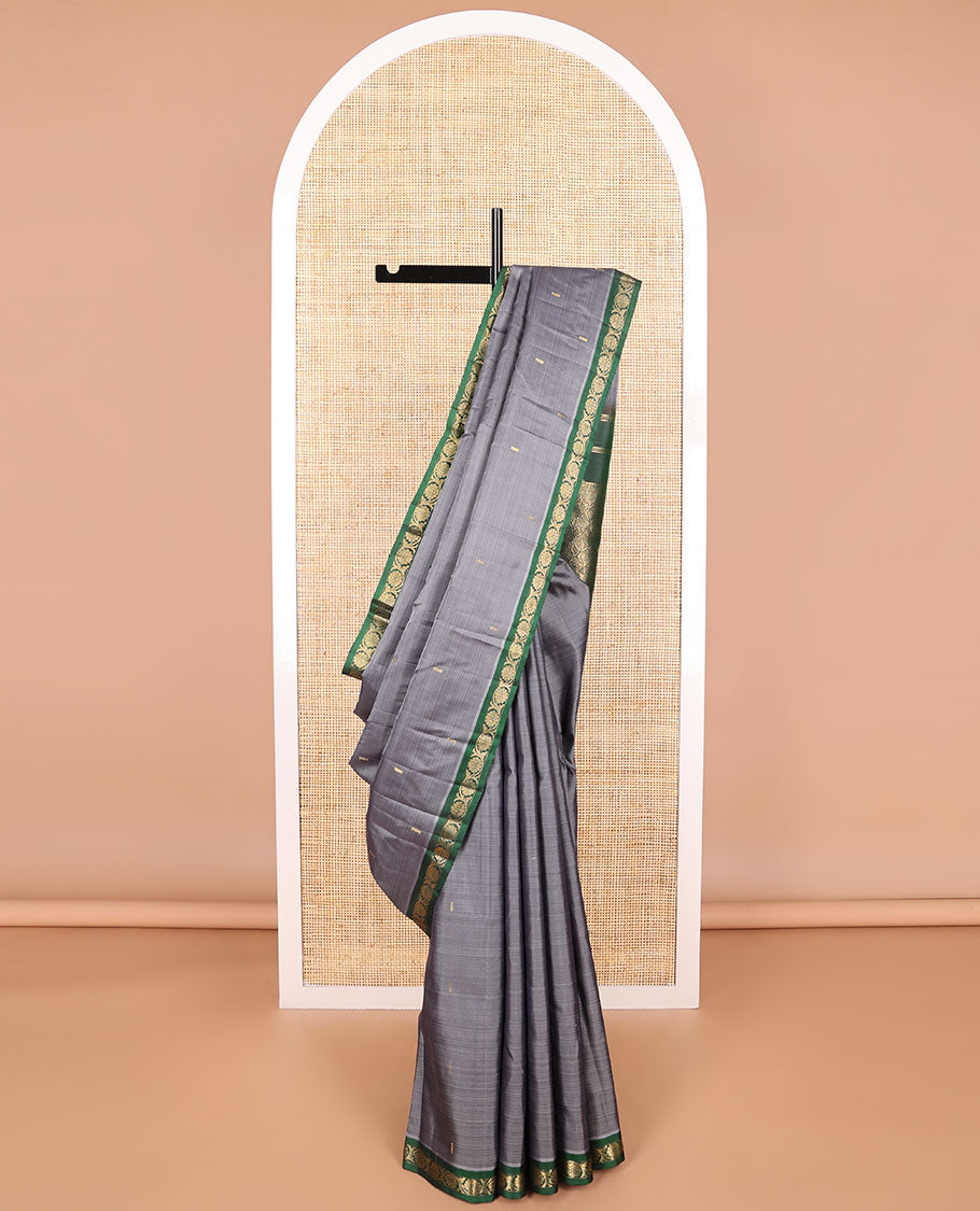 Grey buttas kancheepuram silk saree contrast border of poo chakram des