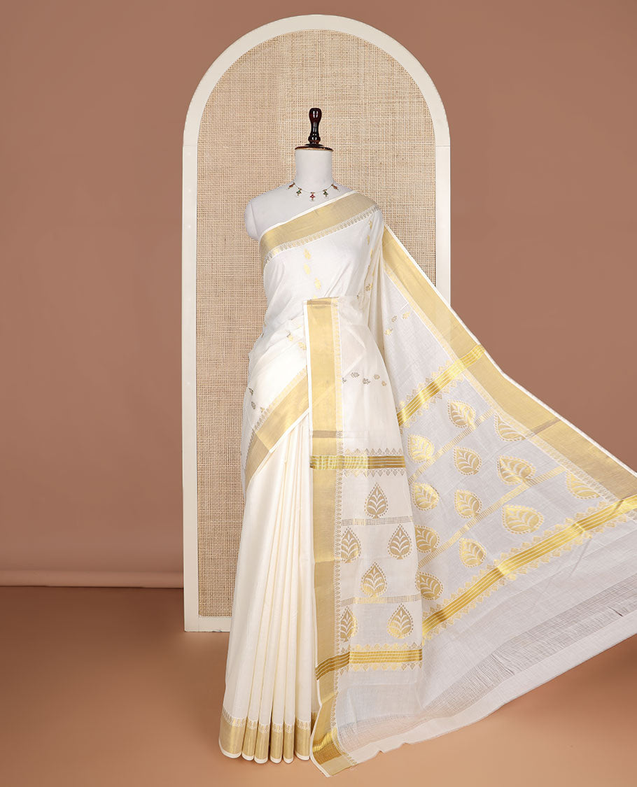 Cream zari buttas Kerala saree, zari border, and pallu of spade shape