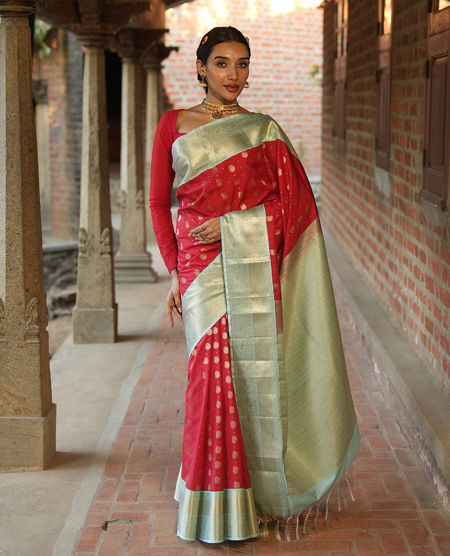 Red BudgetSilk Saree, Spotlighted with Zari Buttas All Over Its Body,